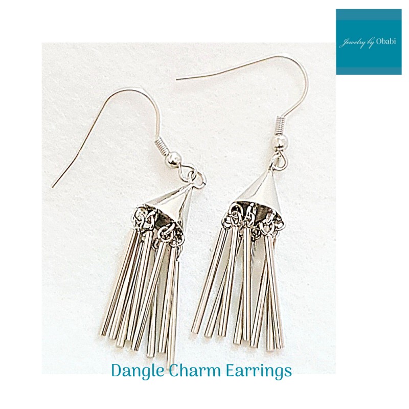 Buy Wind Charm Earrings by Jewelry by Obabi on Selar