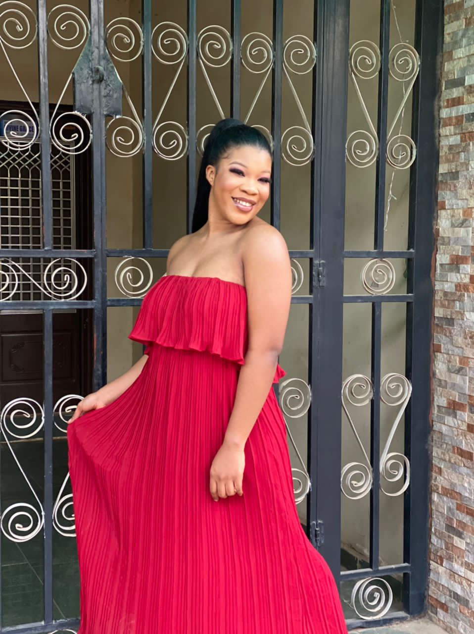 Buy Red pleated dress by Myflair Nigeria on Selar