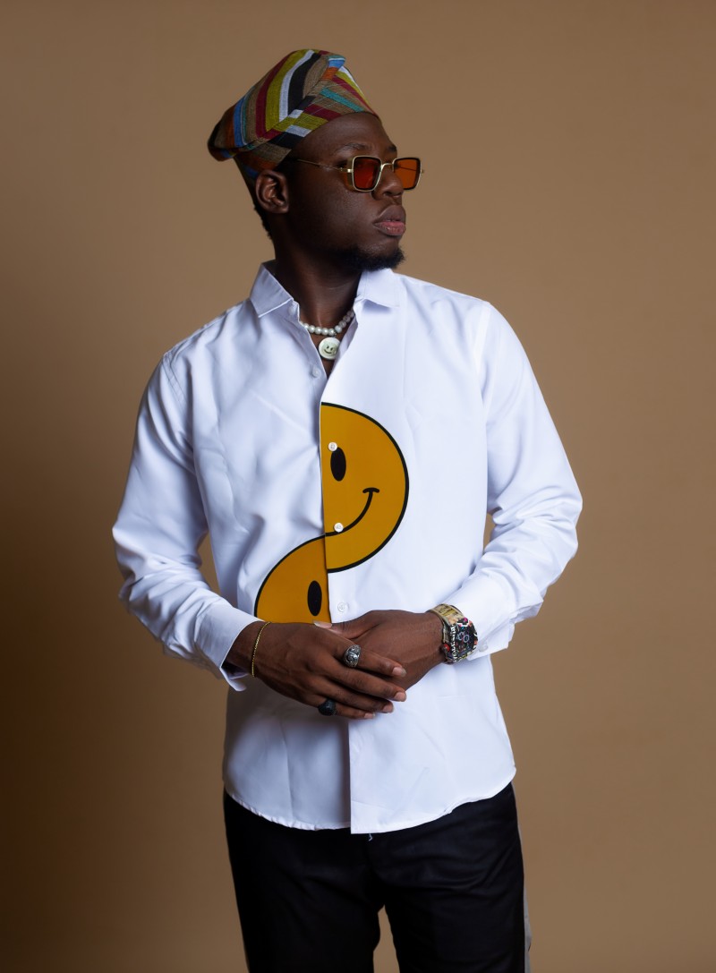 Buy White Smiley face shirt by Olorunsola Ayomipe on Selar