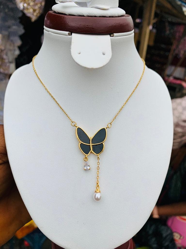 Buy Butterfly pendant necklace by DeedeesPlace on Selar