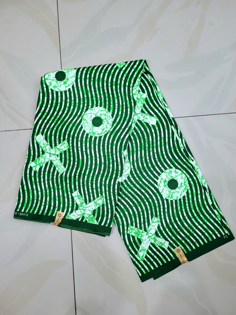 Buy Green XOXO Ankara Print by Fashistry Prints on Selar