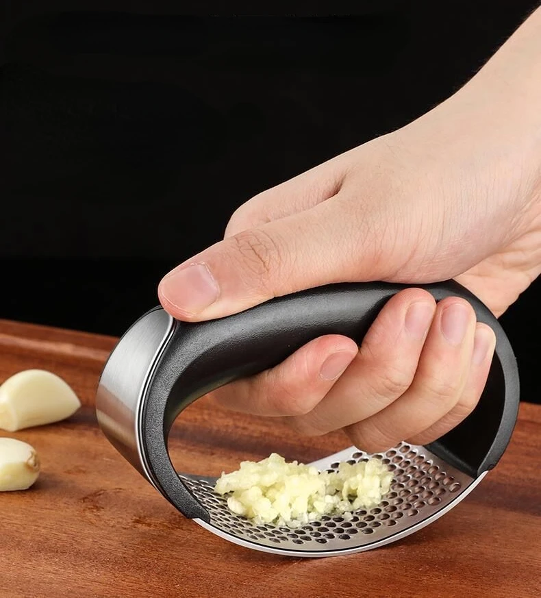 Buy stainless steel garlic crusher by OLIVES on Selar.co